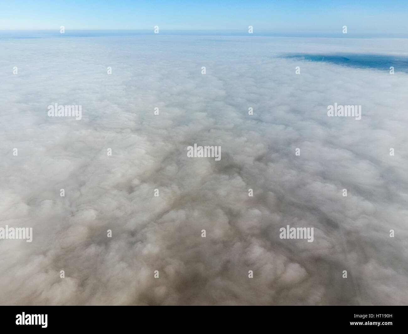 In the skies above the fog. Sunrise over the fog. Clouds near the ...