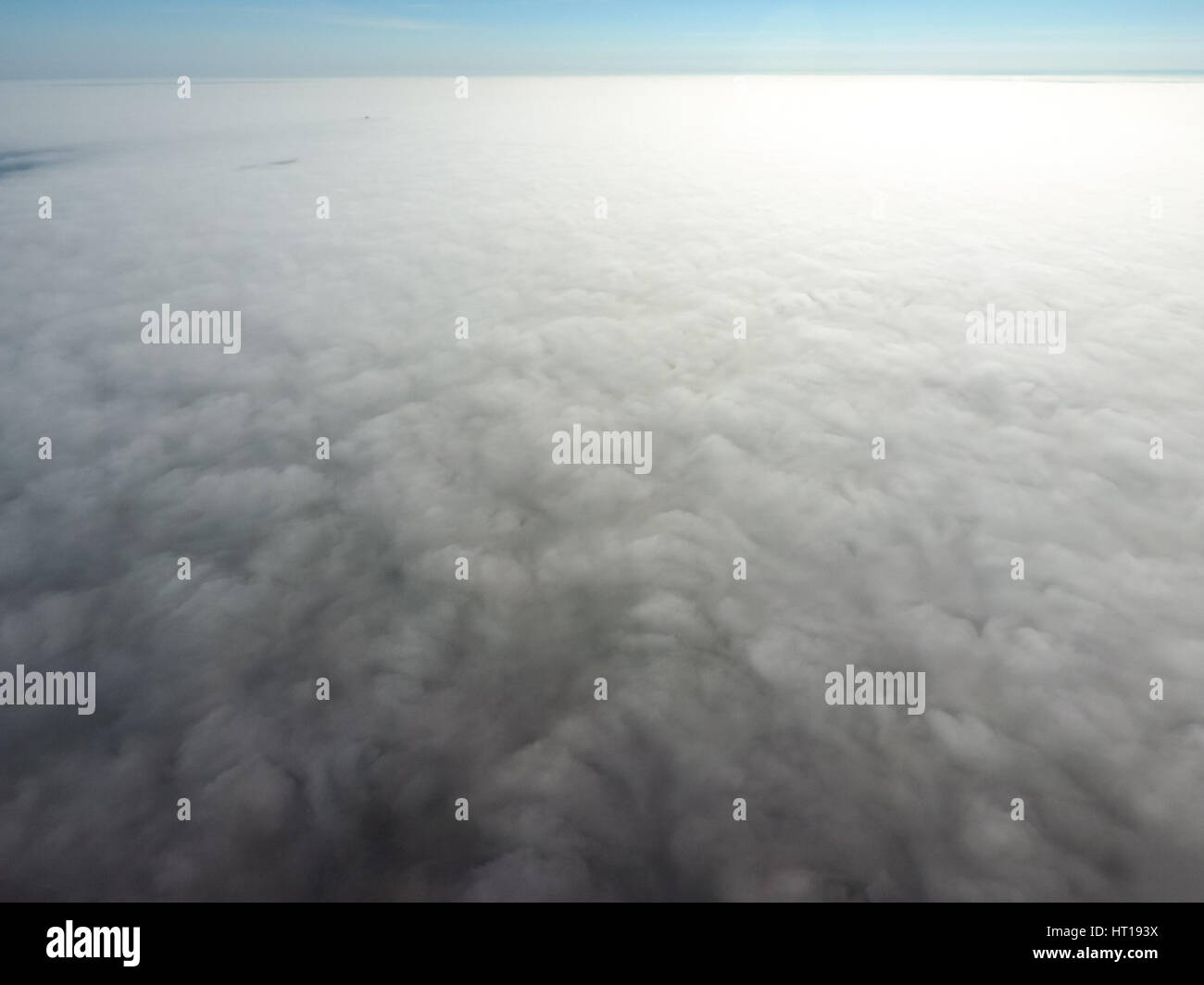 In the skies above the fog. Sunrise over the fog. Clouds near the ...