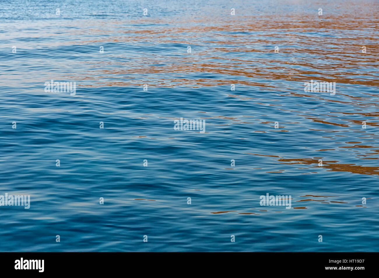 Abstract Sunset Ripples in the Ocean Stock Photo - Alamy