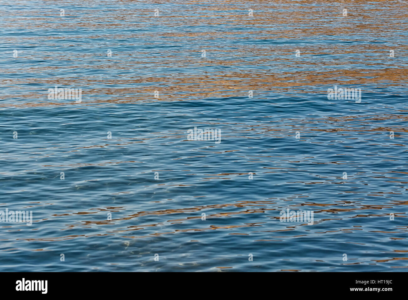 Abstract Sunset Ripples in the Ocean Stock Photo - Alamy