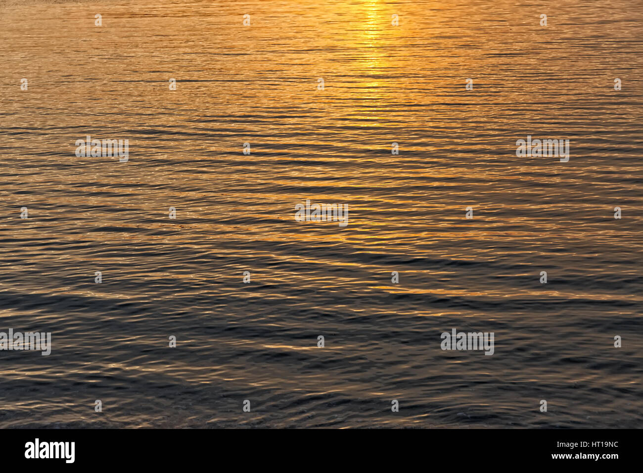 Abstract Sunset Ripples in the Ocean for background Stock Photo - Alamy