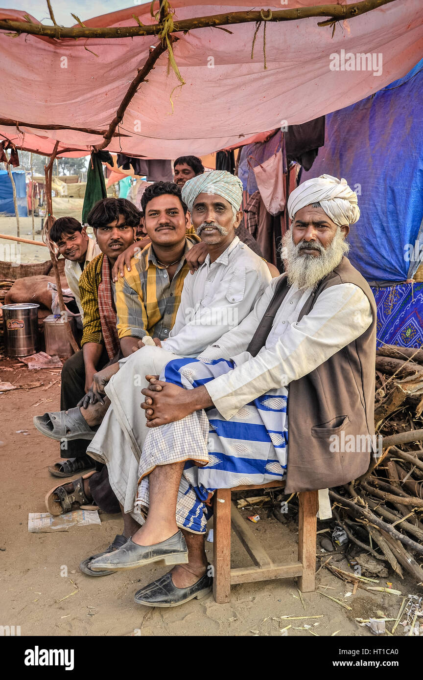 Proud Rajasthani Gentlemen sat on a bench Stock Photo - Alamy