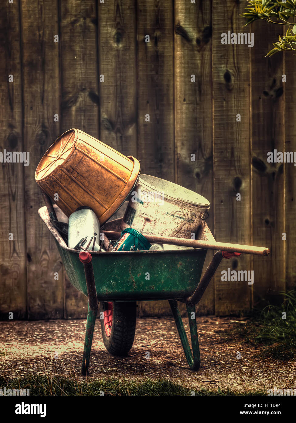 over flowing wheel barrow Stock Photo - Alamy