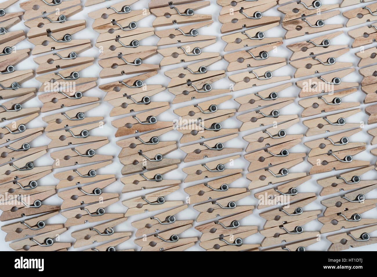 Macro photo of wooden mini clothes pegs Stock Photo - Alamy
