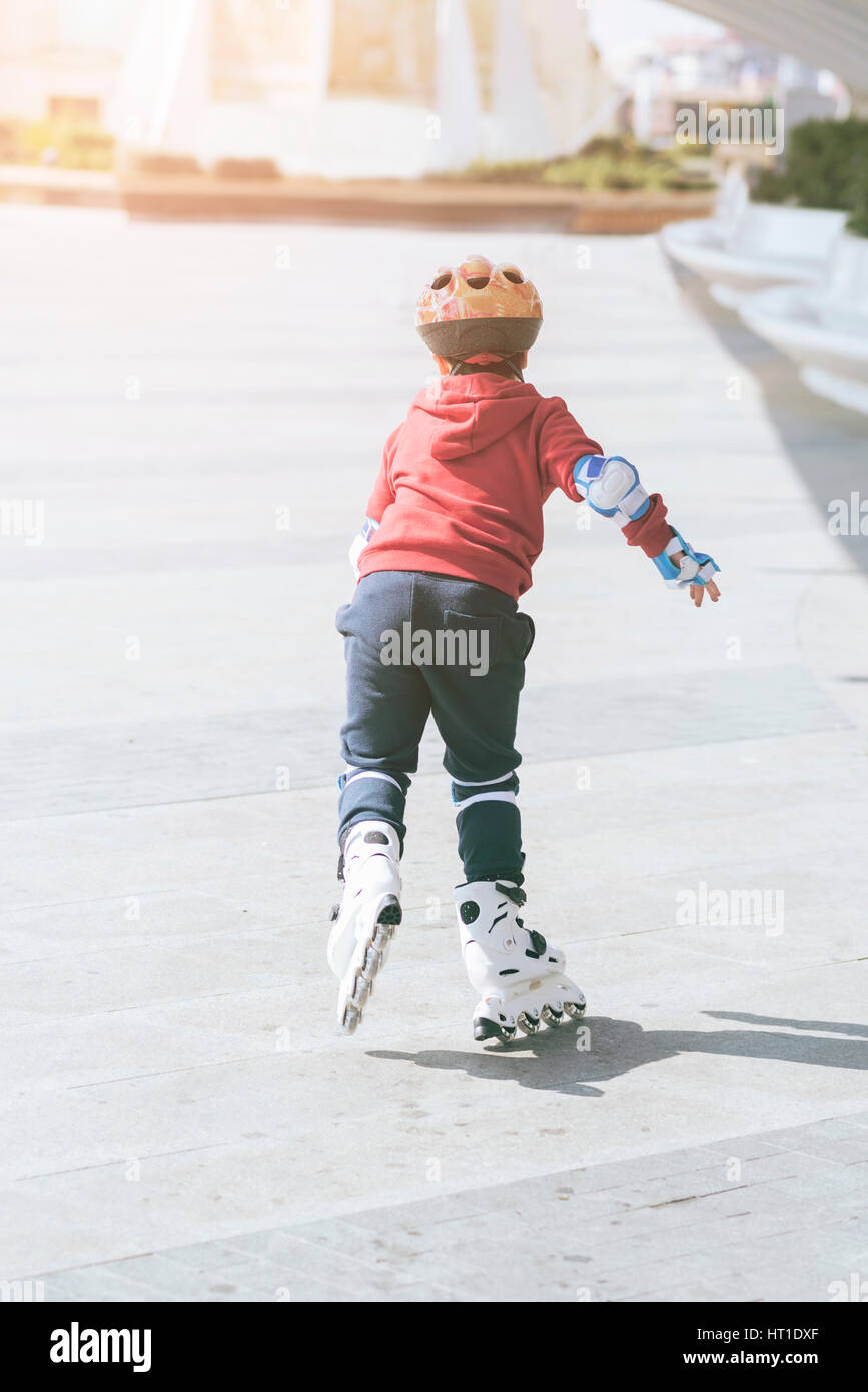 boy in roller skates at a park Stock Photo - Alamy