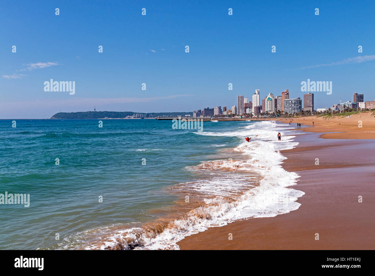 Coastal landscape with beach ocean blue sky and city skyline in Durban ...