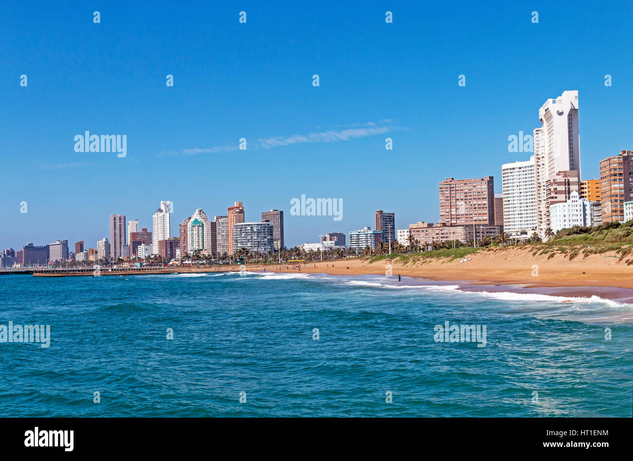Coastal landscape with beach ocean blue sky and city skyline in Durban ...