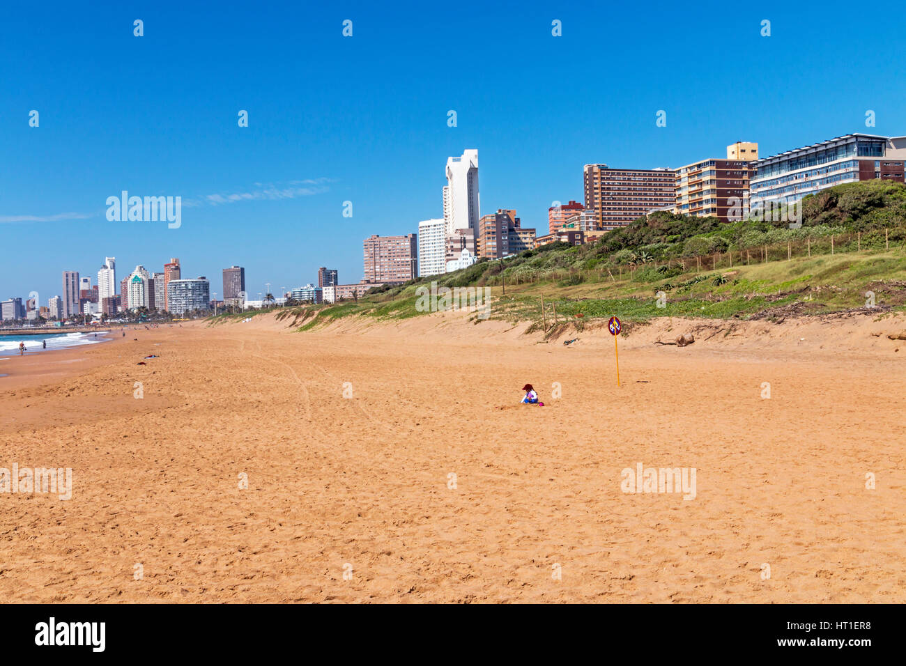 Coastal landscape with beach ocean blue sky and city skyline in Durban ...