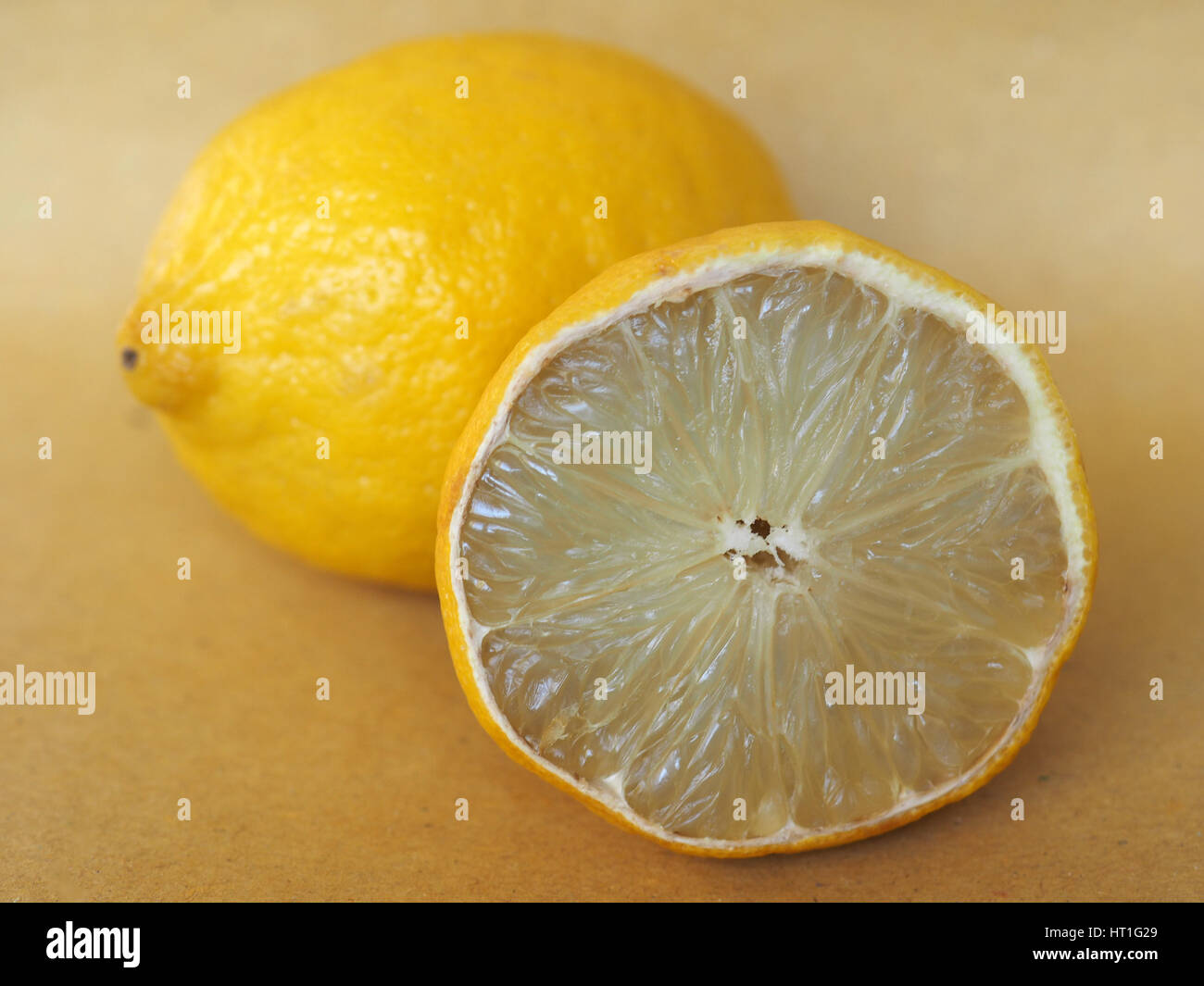 yellow lemon (Citrus x limon) whole fruit and sliced Stock Photo - Alamy