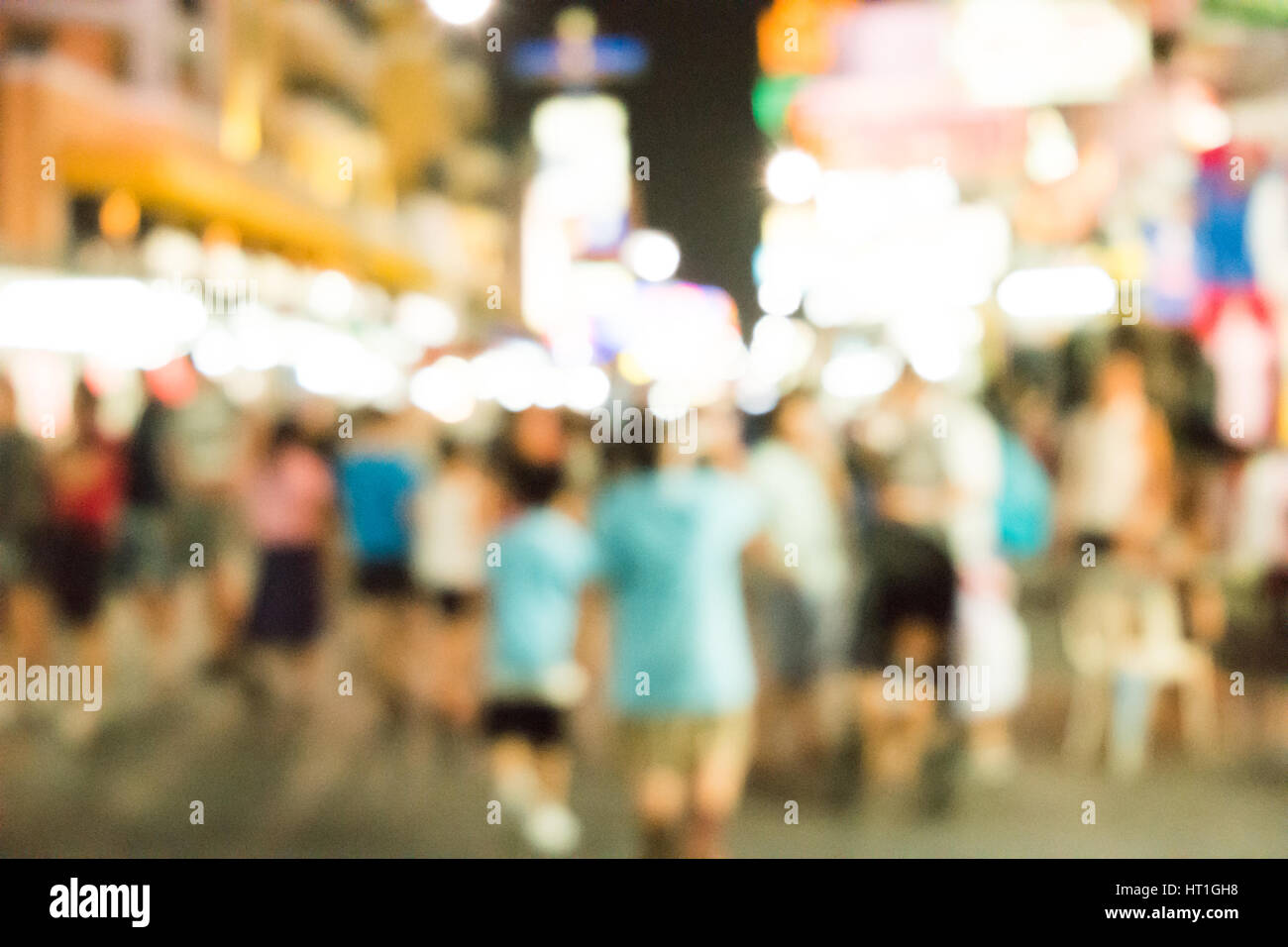 Blurred image of busy night life in the city. Defocused photo of night ...