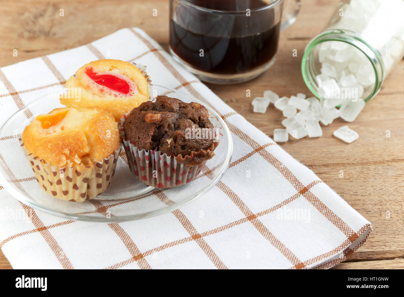 Cupcake various flavors in wood tray on wood table. coffee break Stock ...