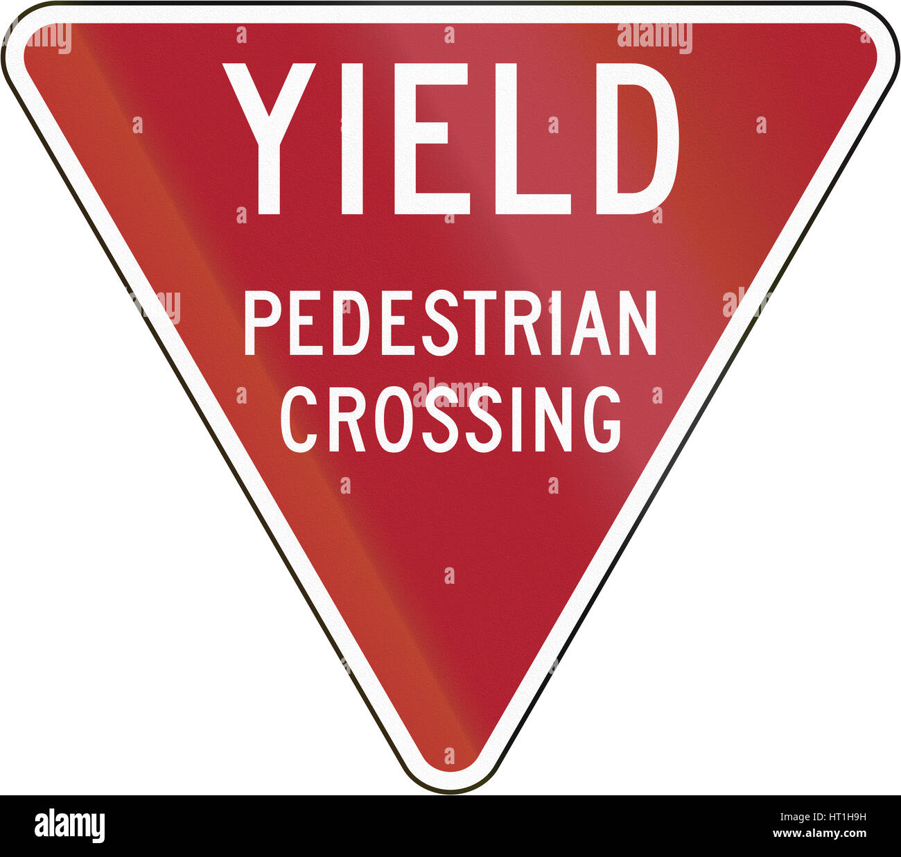 Yield To Pedestrian Crossing sign in the United States Stock Photo - Alamy