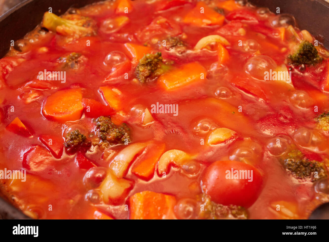 preparing of tomato ragout at domestic kitchen Stock Photo - Alamy