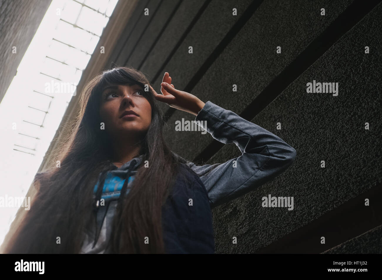 confused woman walk on street. Thoughtful woman in street style fashion ...