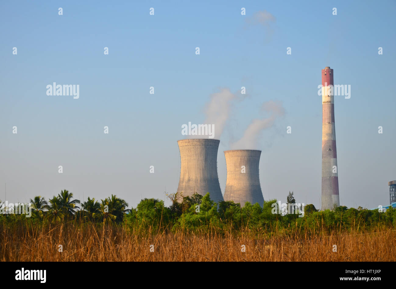 Cooling tower and chimney of a thermal power plant Stock Photo - Alamy