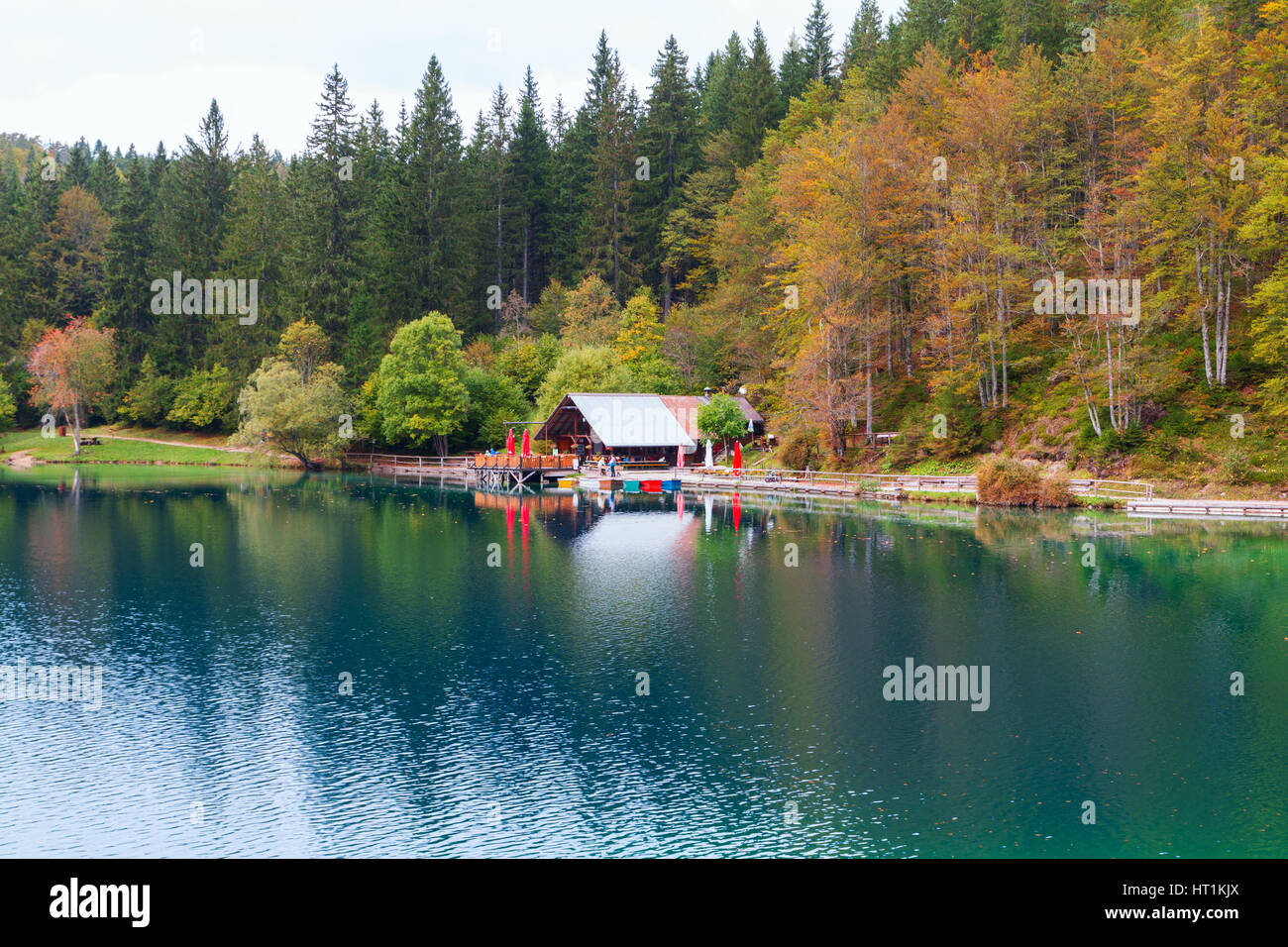 Beautiful Lago di Fusine the mountain lake and Mangart mountain in the ...