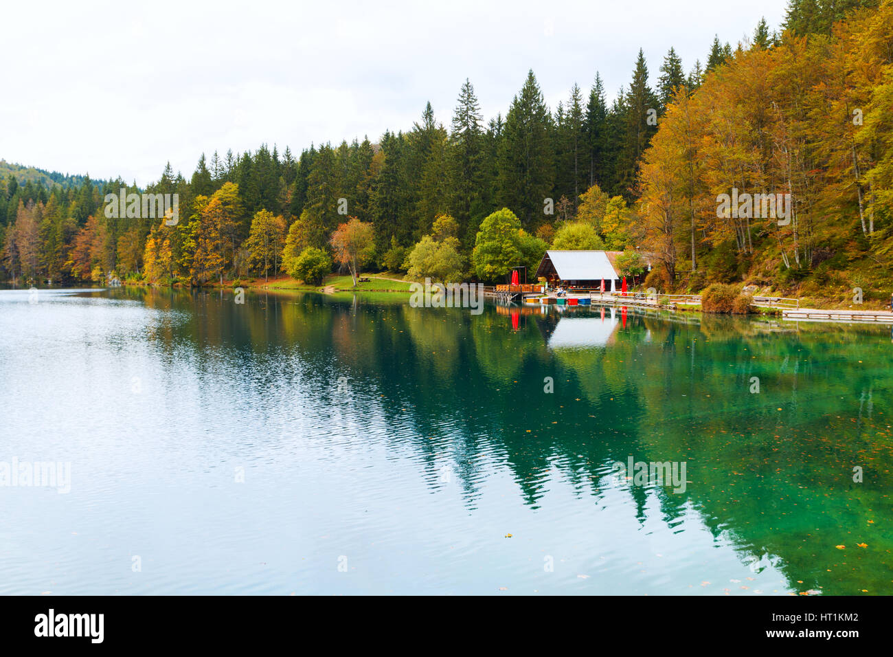 Beautiful Lago di Fusine the mountain lake and Mangart mountain in the ...