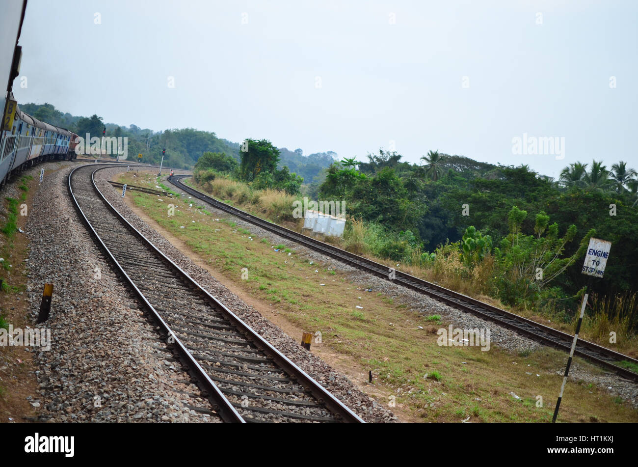 Railway Tracks passing through a rural area Stock Photo - Alamy