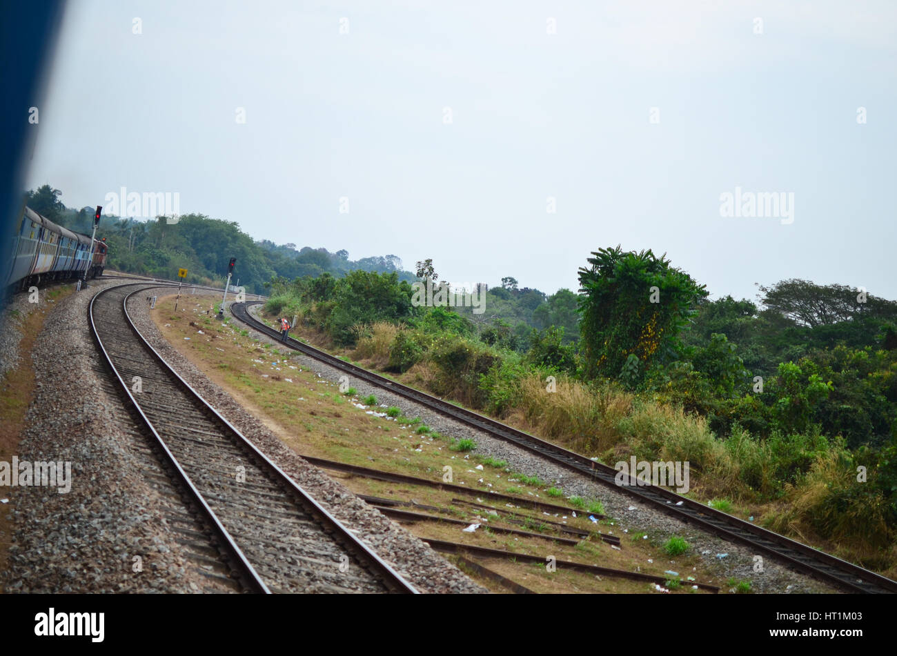 Railway tracks passing through a rural area Stock Photo - Alamy