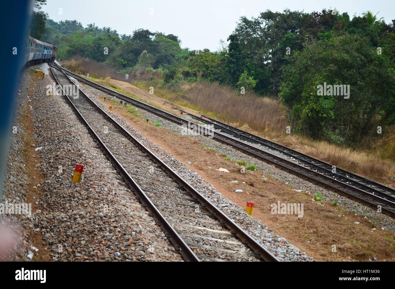 Railway tracks passing through a rural area Stock Photo - Alamy
