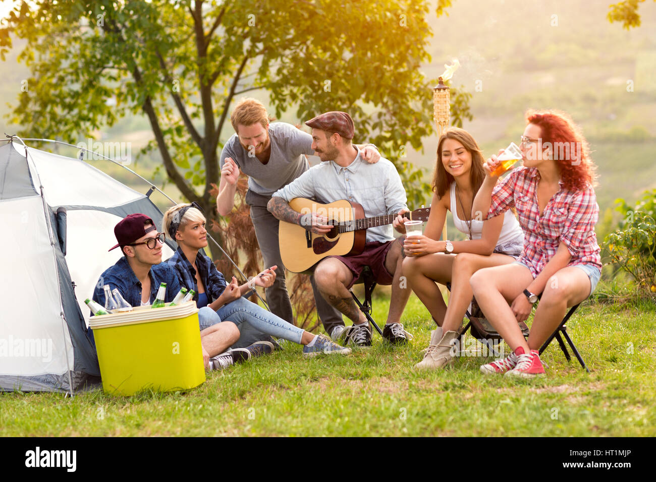 Cheerful group young friends relaxing hi-res stock photography and ...
