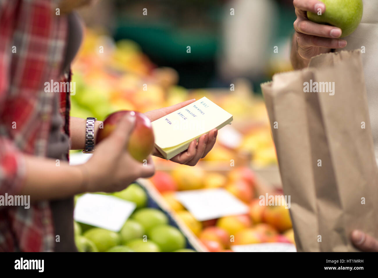 checking list customer at market Stock Photo - Alamy