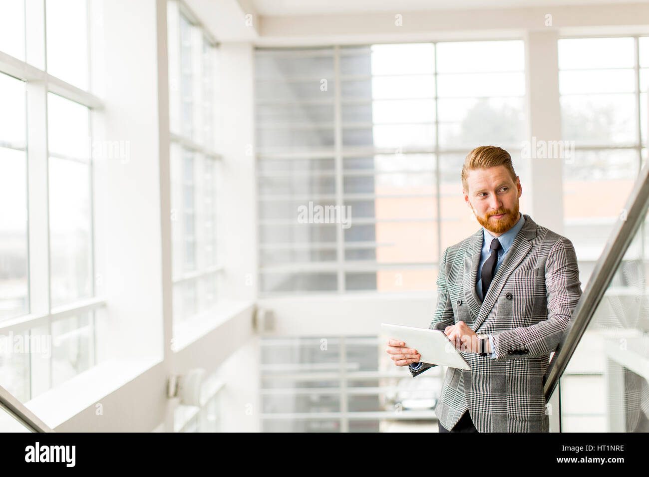 Male managing director dressed in luxury corporate clothes working on ...
