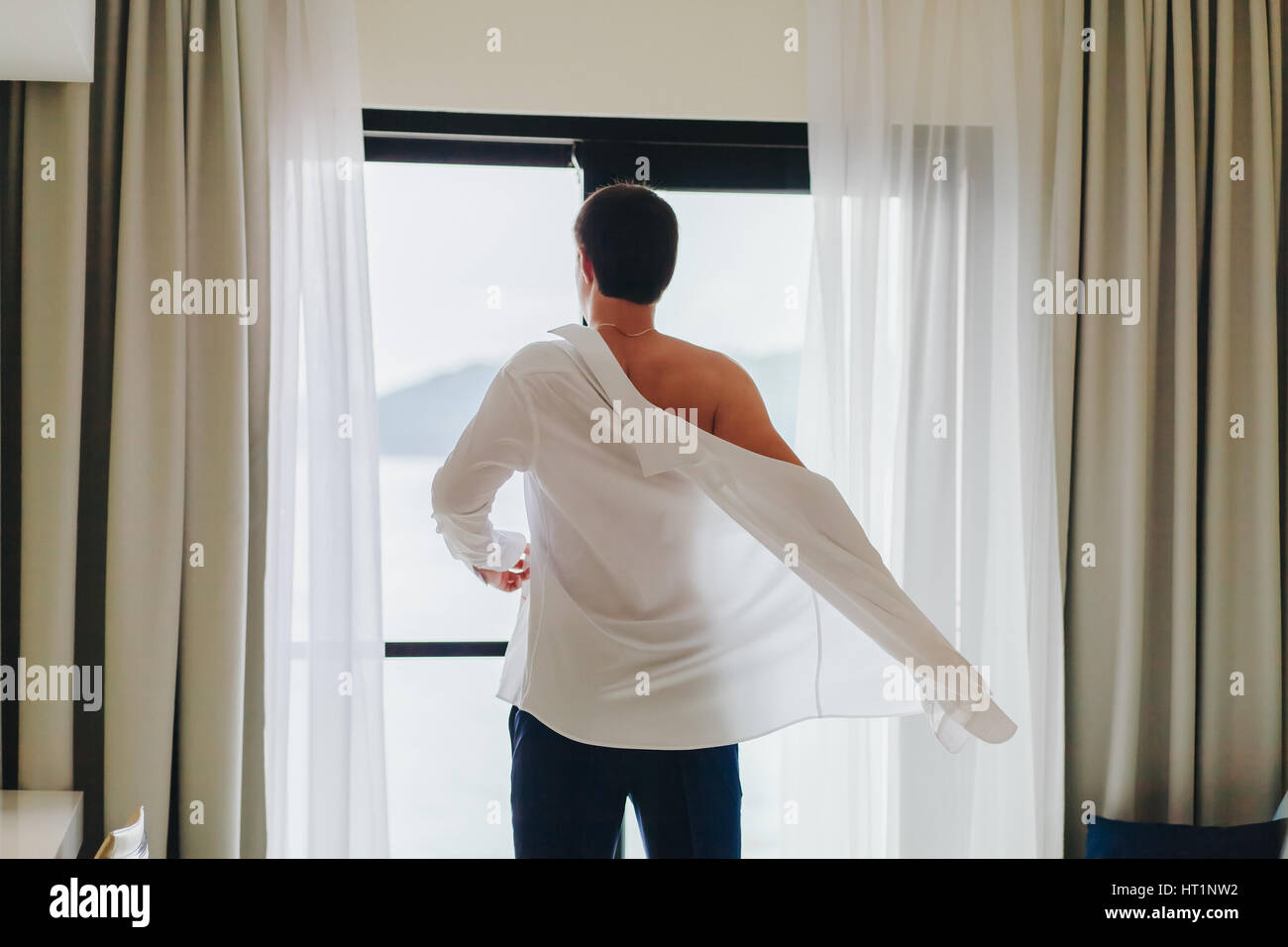 man getting dressed. Manw getting ready to dress and business meeting ...