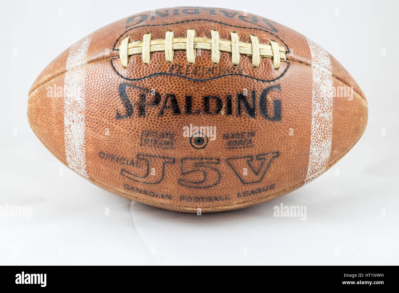 An old used Spalding J5V brown leather football Stock Photo - Alamy