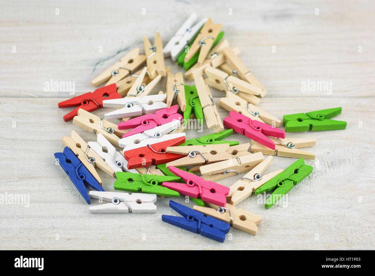 Pins of different colors lying on a light background Stock Photo - Alamy