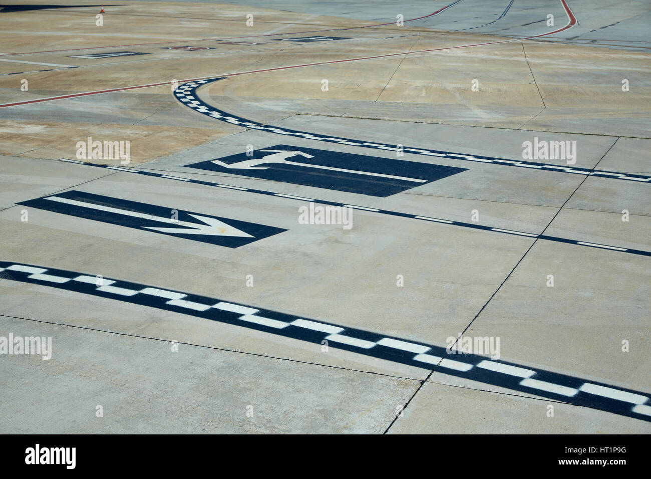 Airport road floor signs painted generic signals Stock Photo - Alamy