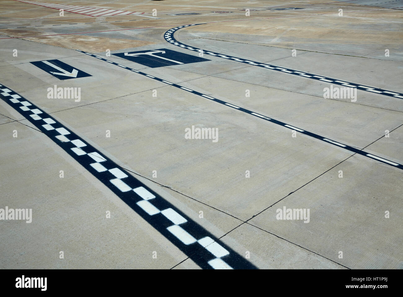 Airport road floor signs painted generic signals Stock Photo - Alamy