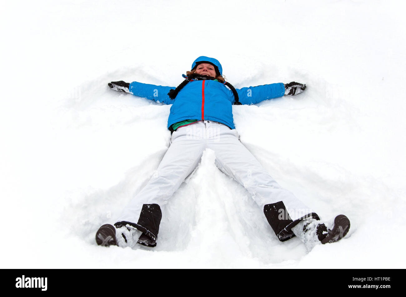 Children making snow angel hi-res stock photography and images - Alamy
