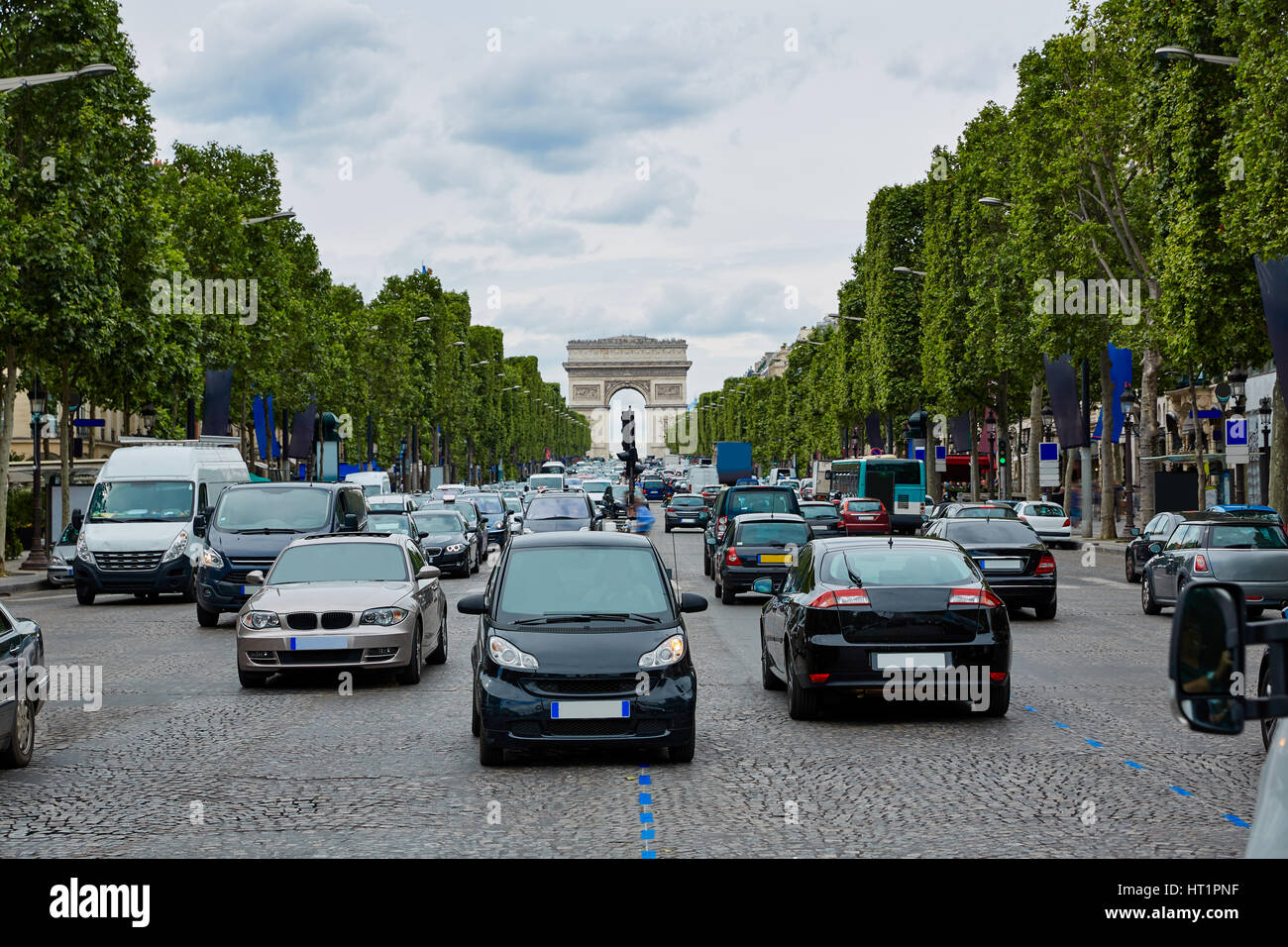 Champs Elysees avenue traffic in Paris at France Stock Photo - Alamy