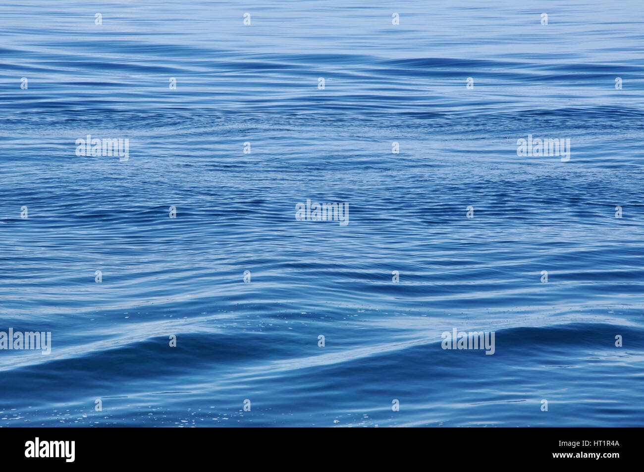 Water surface with waves and ripples as background Stock Photo - Alamy