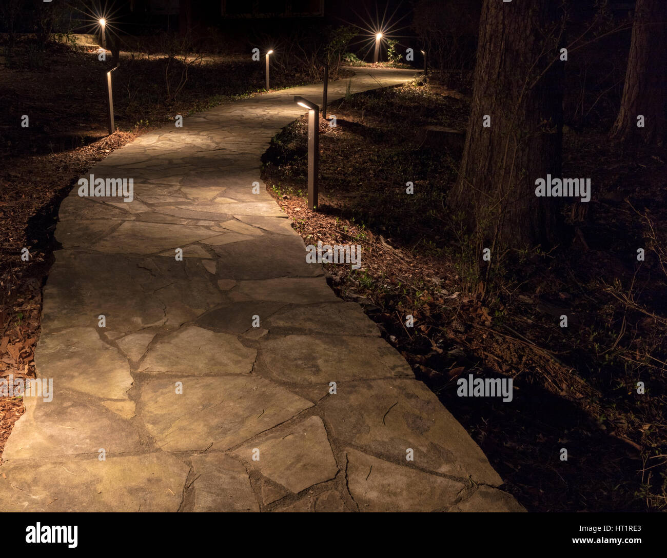 Illuminated Stone Path Stock Photo - Alamy