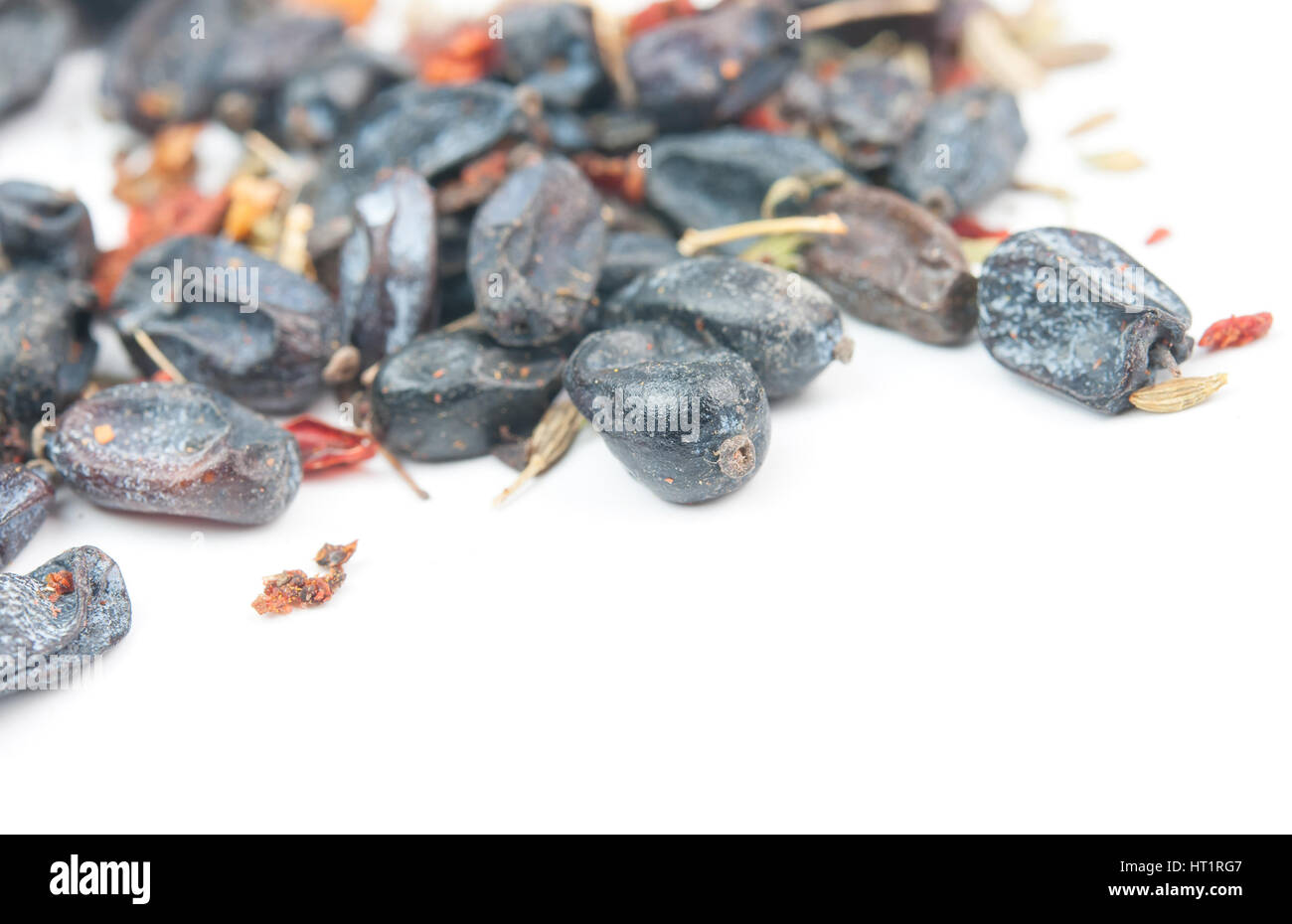 black dry barberry spice. Isolated on white background Stock Photo - Alamy