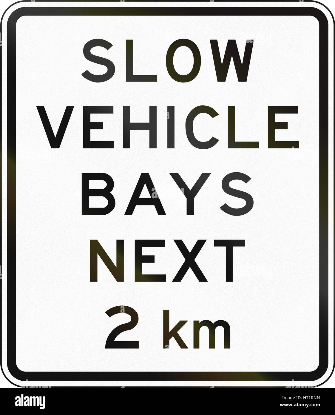 New Zealand road sign - Slow vehicle bays for the next 2 kilometres ...