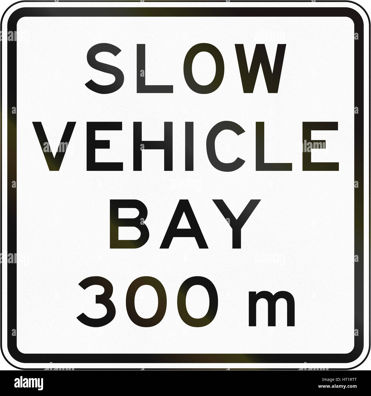 New Zealand road sign - Slow vehicle bay ahead in 300 metres Stock ...