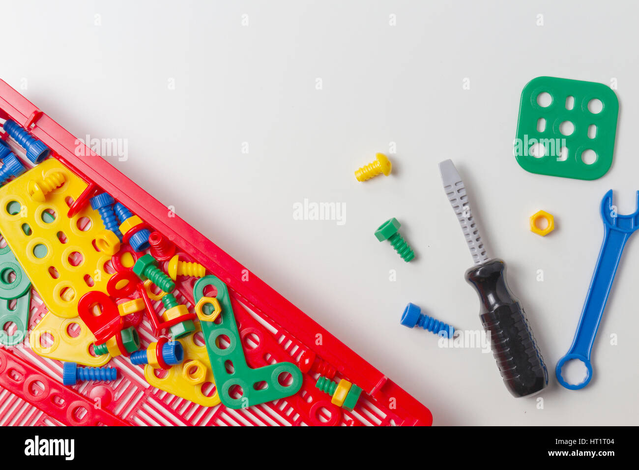 Kids toy tool kit for education on white background Stock Photo - Alamy
