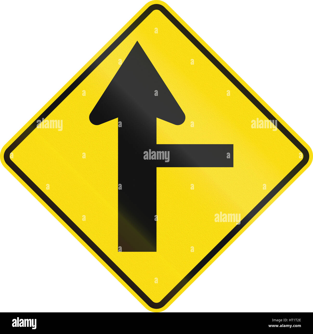 New Zealand road sign - Side road junction controlled on right Stock ...