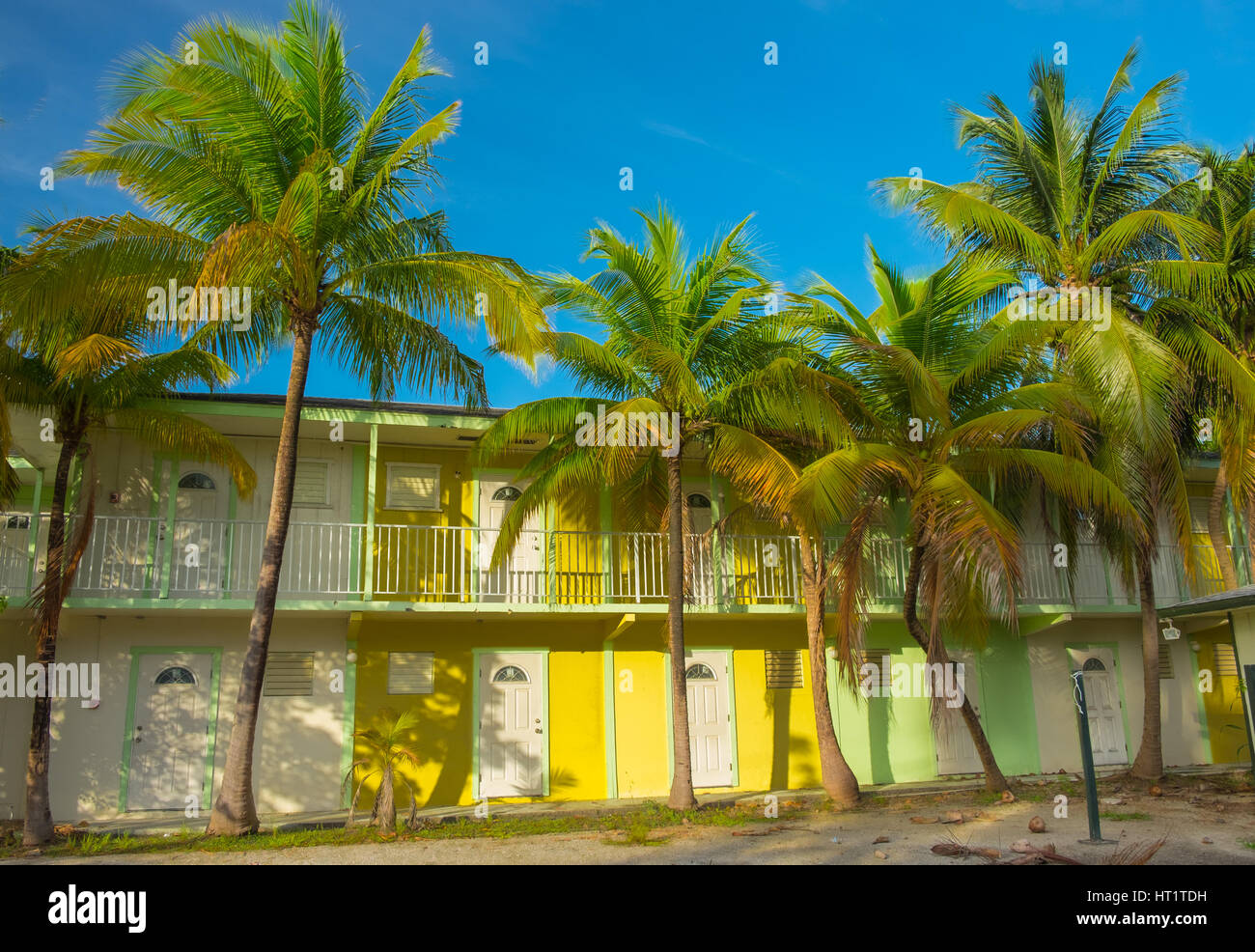 Grand Cayman, Cayman Islands, vacant two-story colorful Caribbean-style ...