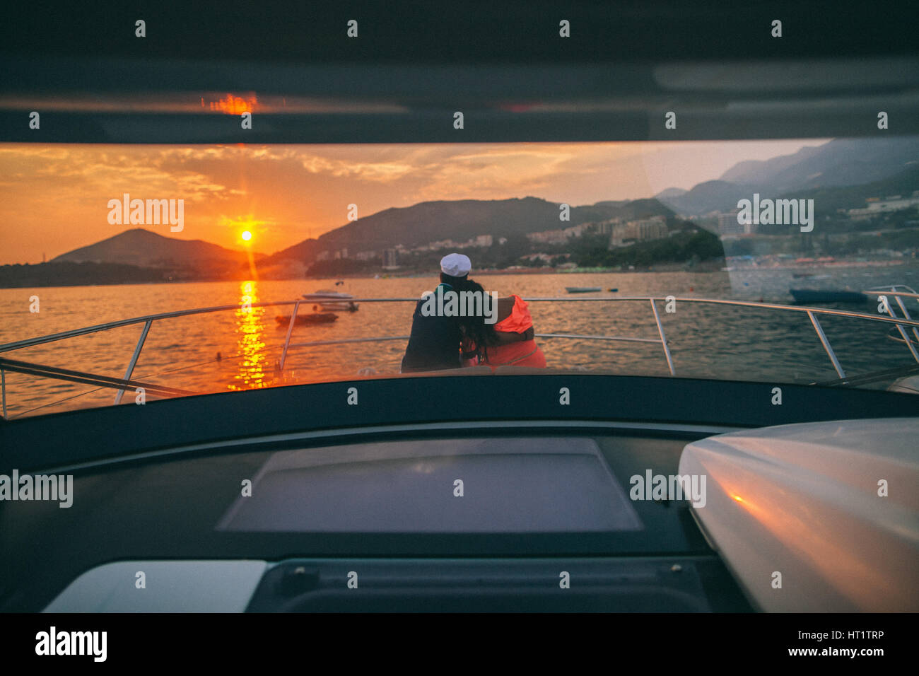 honeymoon couple travel on yacht. Back view. Montenegro Stock Photo - Alamy