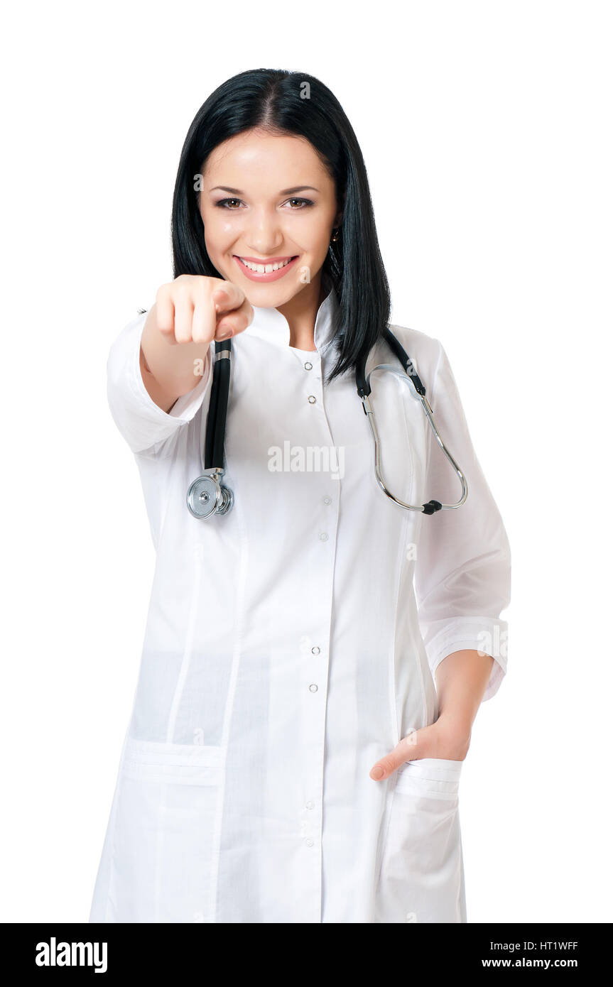 Smiling medical doctor woman pointing finger to you isolated on white ...
