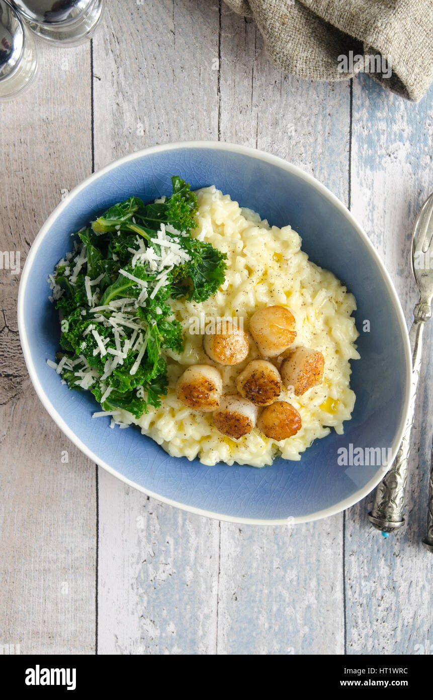 Brown butter scallops with Parmesan risotto Stock Photo - Alamy