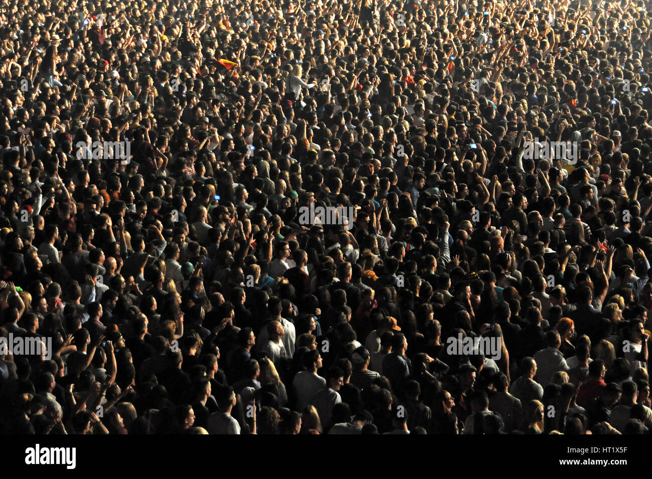 CLUJ NAPOCA, ROMANIA – AUGUST 1, 2015: Crowd of cheerful young people ...