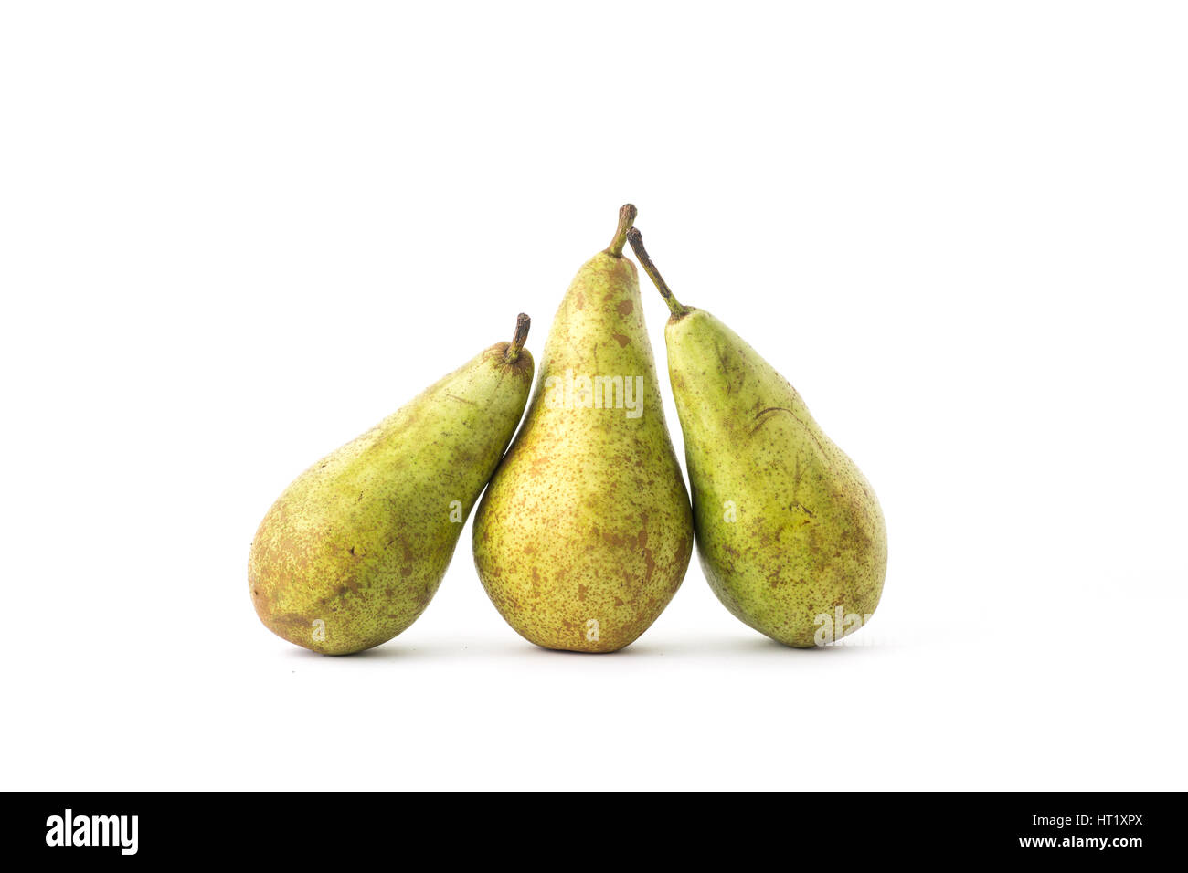 Three Pear lying against each other. Isolated on a white background ...