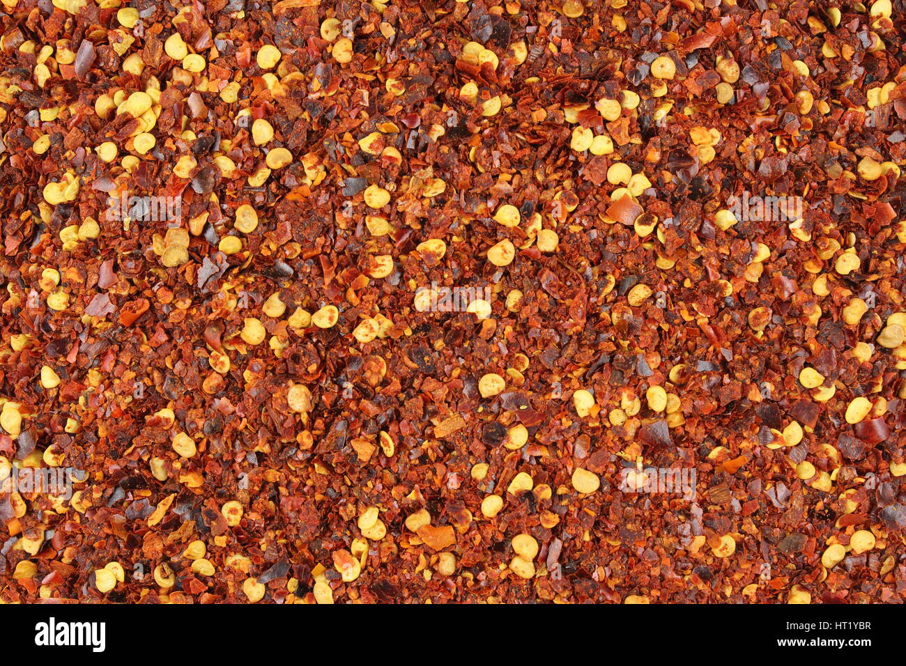 crushed red pepper flakes closeup as a food background texture Stock ...