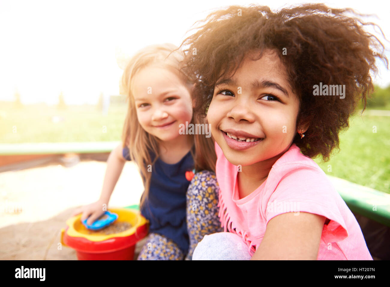 We loves playing together at the playground Stock Photo - Alamy