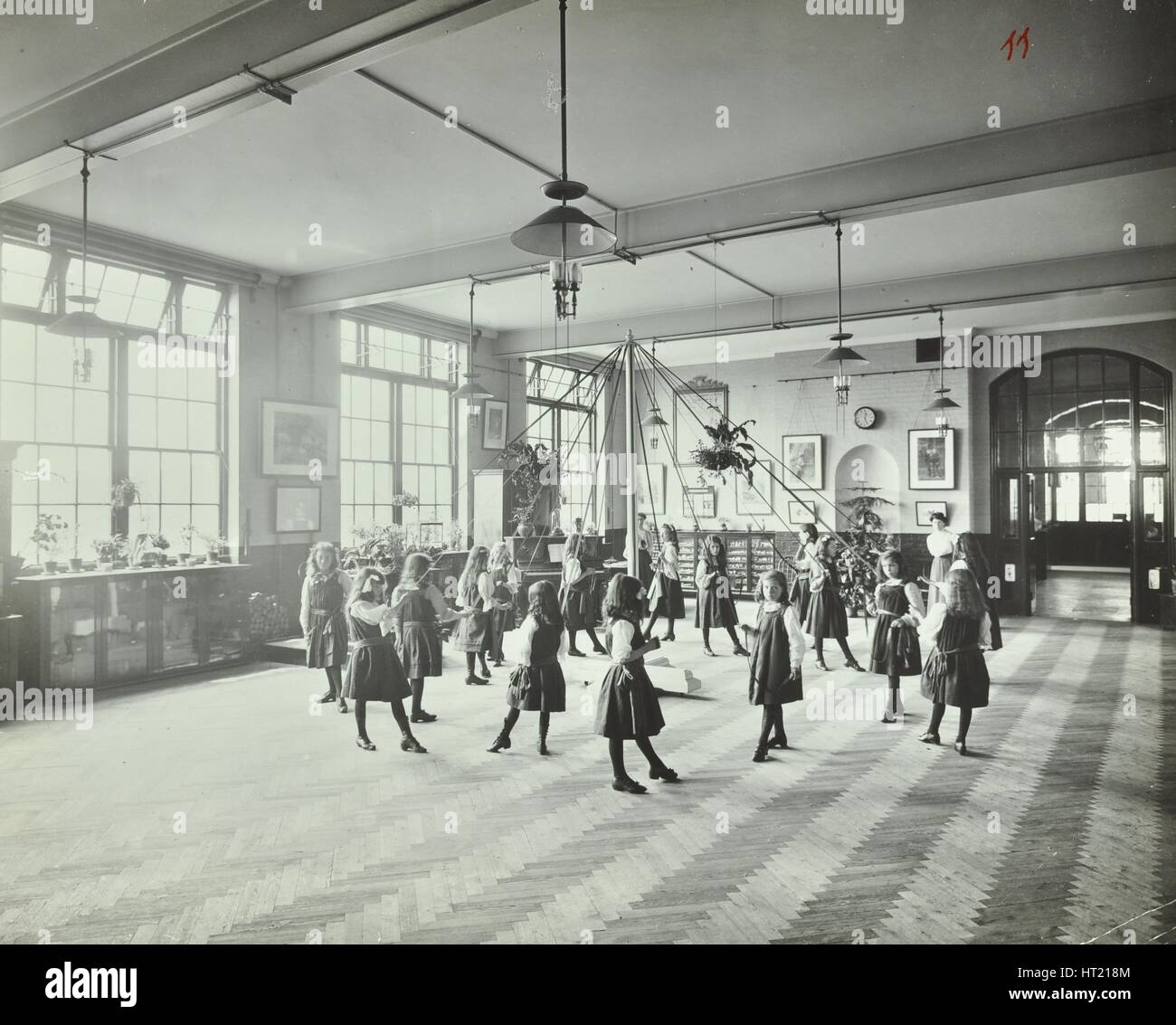 Girls dancing around a maypole, Hugon Road School, Fulham, London, 1907 ...
